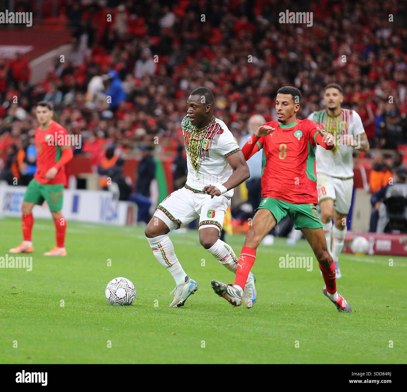Aliou Dieng of Mali, Azzeddine Ounahi of Morocco during the AFCON Group ...