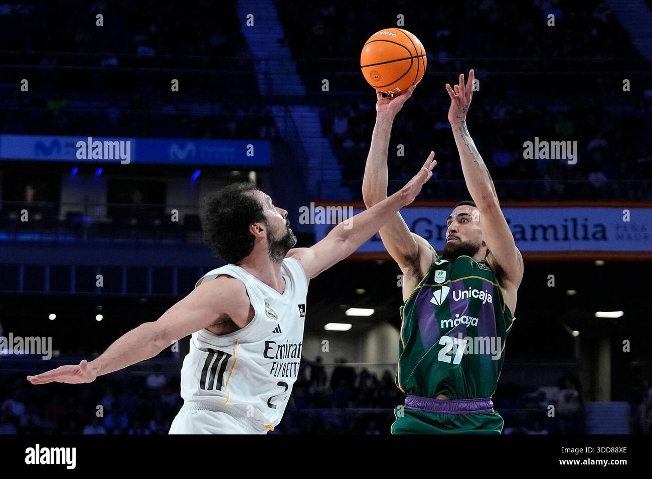 Real Madrid Baloncesto's Sergio Llull (l) and Unicaja Baloncesto Malaga ...