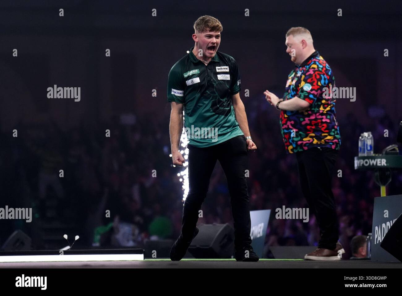 England's Charlie Manby (left) celebrates defeating England's Ricky ...
