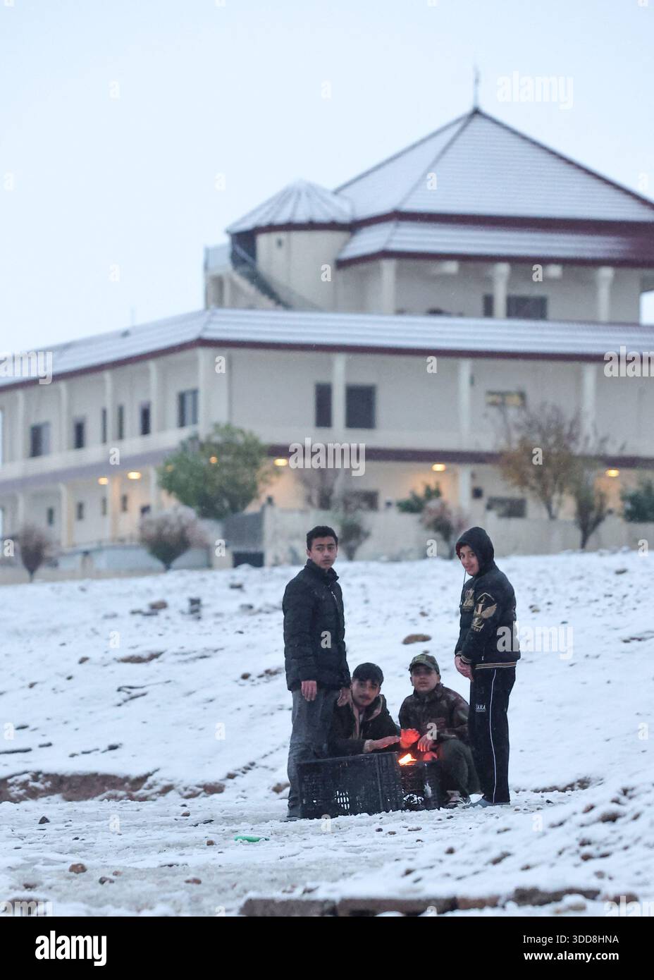 Residents of Baharka district celebrate the first significant snowfall ...