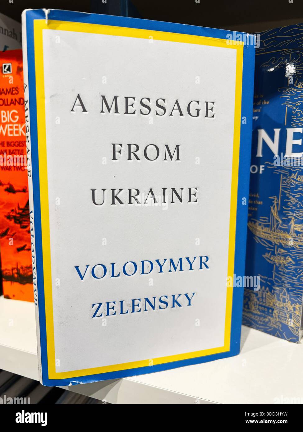 London, UK - December 12, 2025: A white book cover with blue and yellow ...