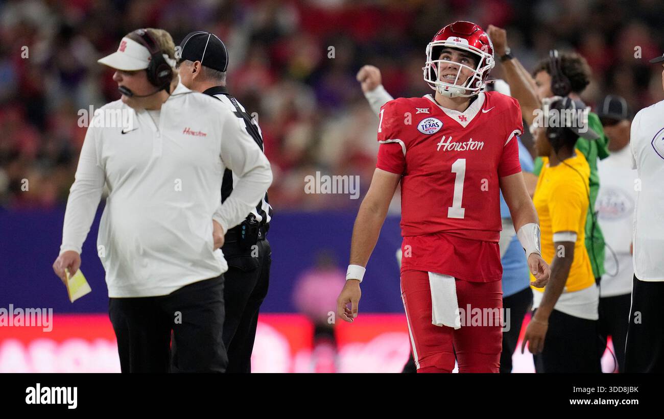 Houston quarterback Conner Weigman (1) looks up at the scoreboard as he ...