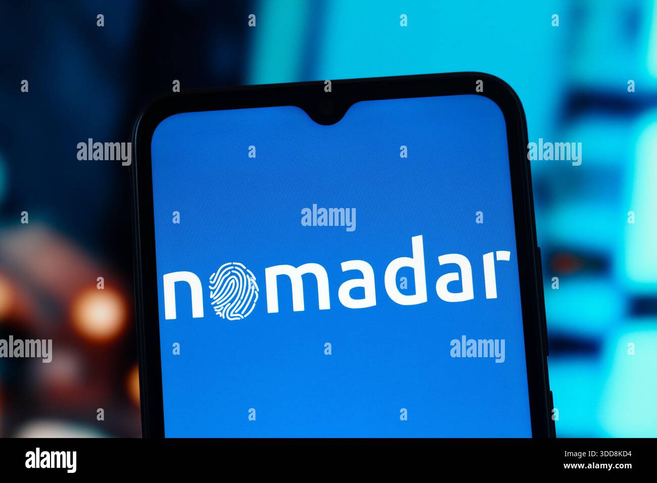 In this photo illustration, the Nomadar Corp. logo is seen displayed on ...