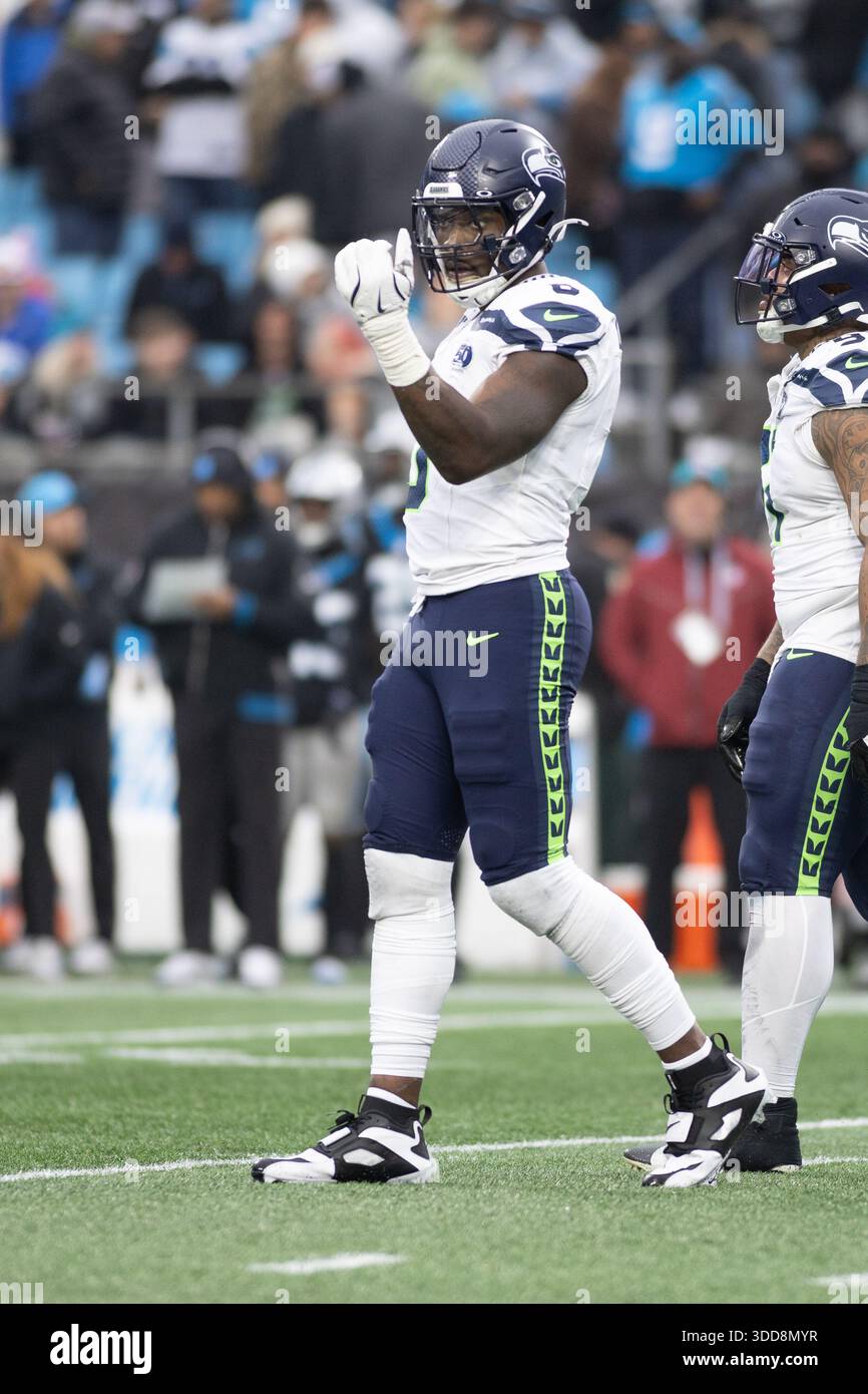 Seattle Seahawks defensive end Demarcus Lawrence (0) celebrates a sack ...