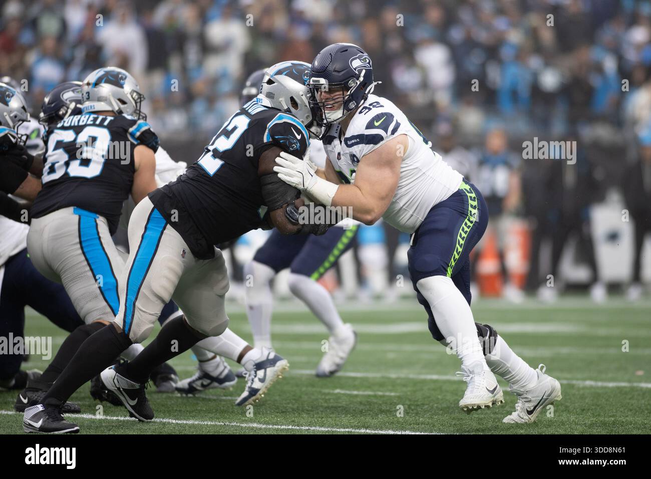 Seattle Seahawks defensive tackle Rylie Mills (98) rushes the offense ...
