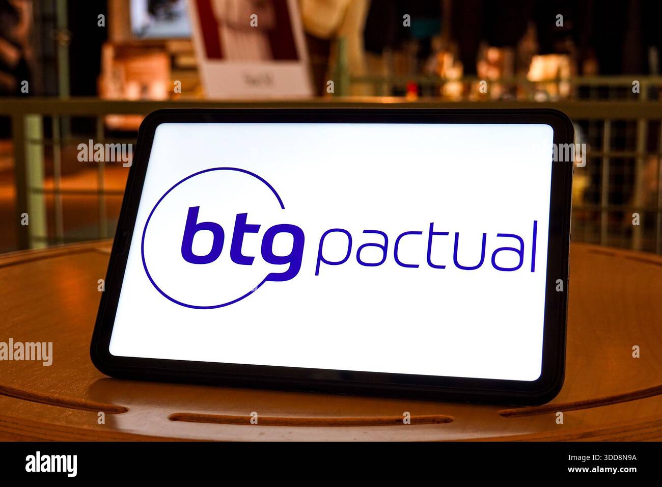 In this photo illustration, the logo of BTG Pactual is seen displayed ...