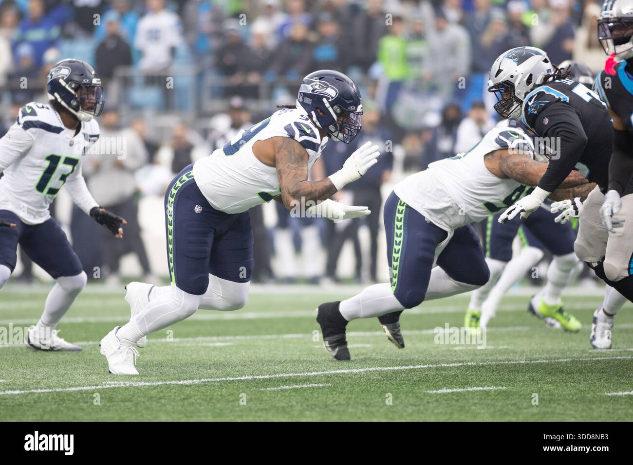 Seattle Seahawks defensive end Leonard Williams (99) rushes the offense ...