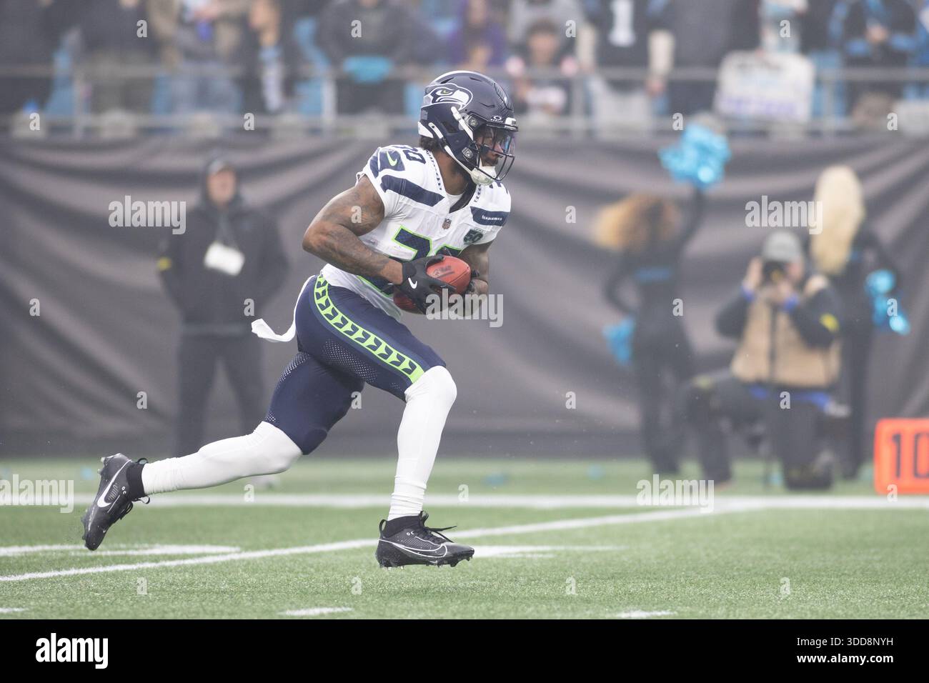 Seattle Seahawks running back Cam Akers (30) returns a kickoff at Bank ...