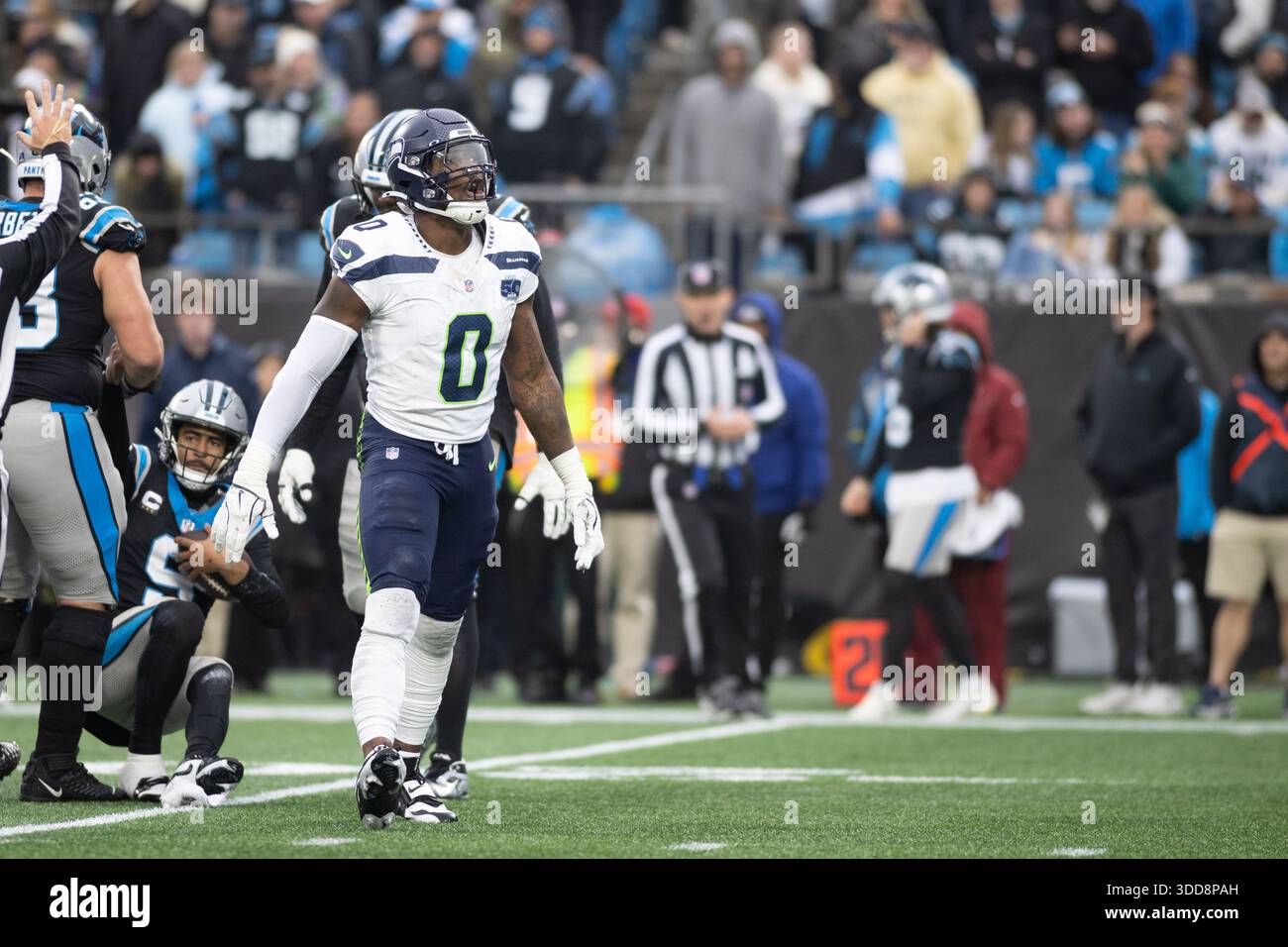Seattle Seahawks defensive end Demarcus Lawrence (0) celebrates a sack ...