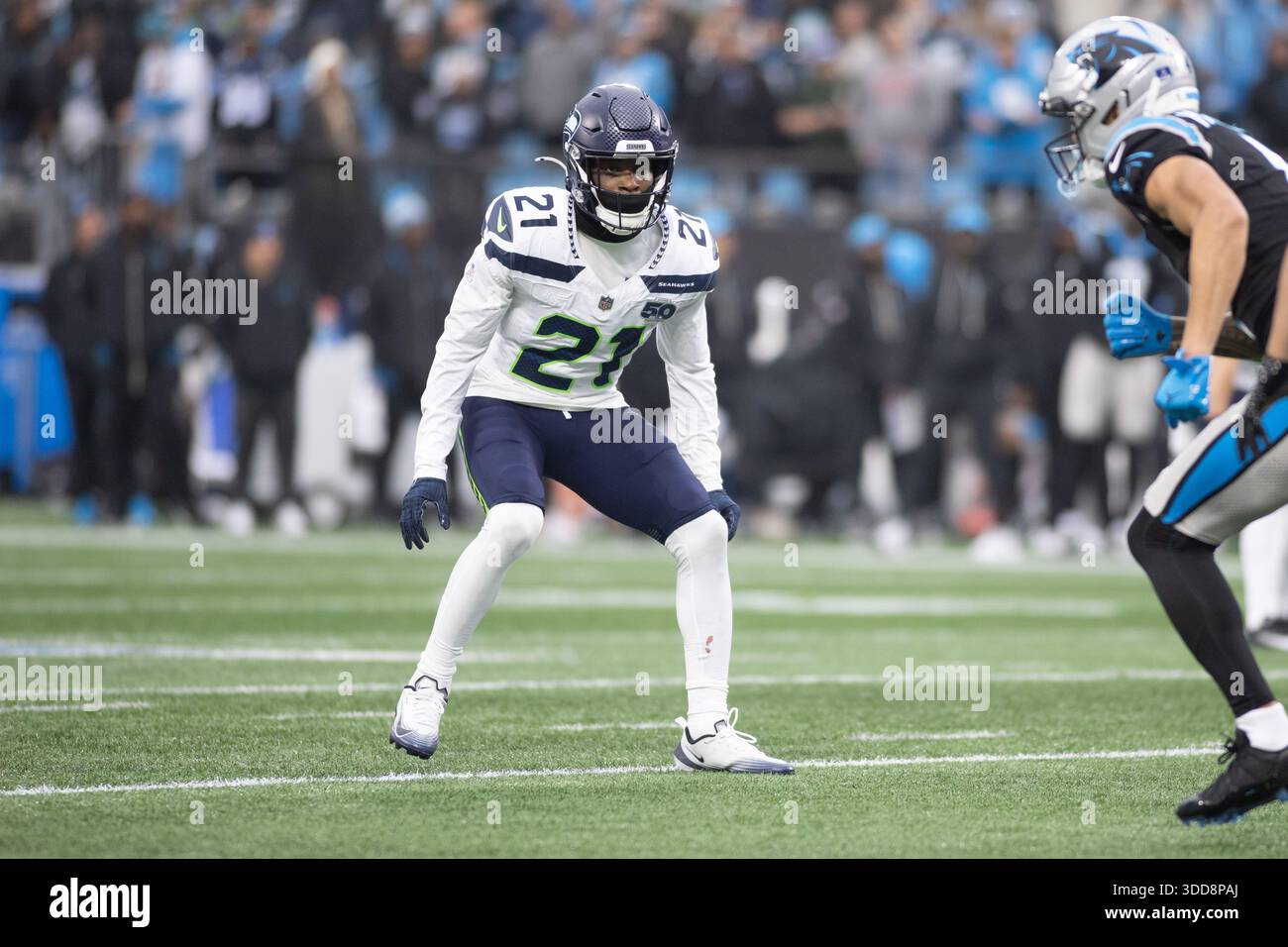 Seattle Seahawks cornerback Devon Witherspoon (21) drops back in ...