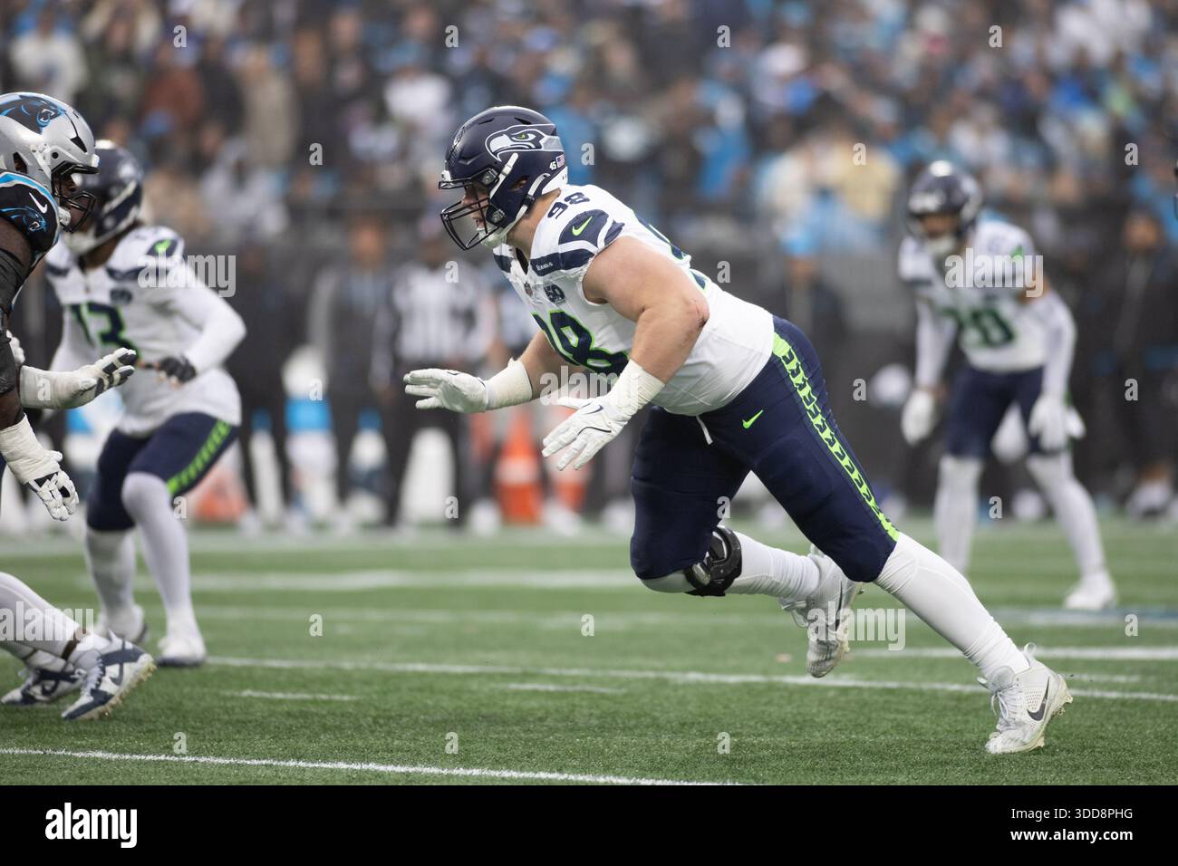 Seattle Seahawks defensive tackle Rylie Mills (98) rushes the offense ...