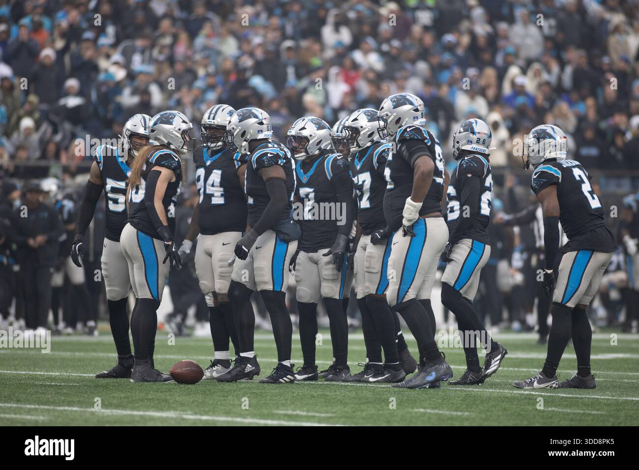 The Carolina Panthers defense huddles between plays at Bank of America ...