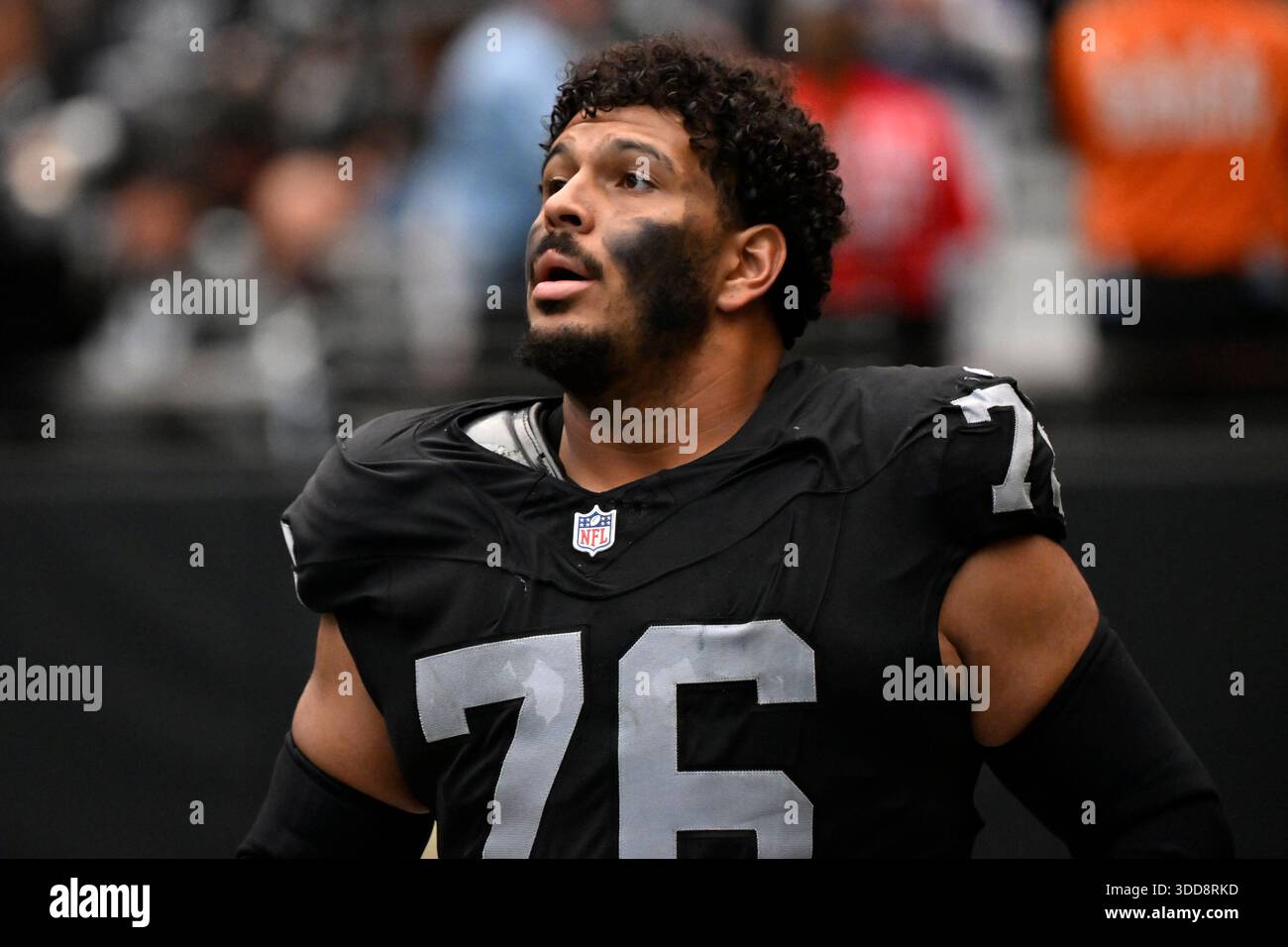 Raiders guard Caleb Rogers (76) takes the field after halftime during ...