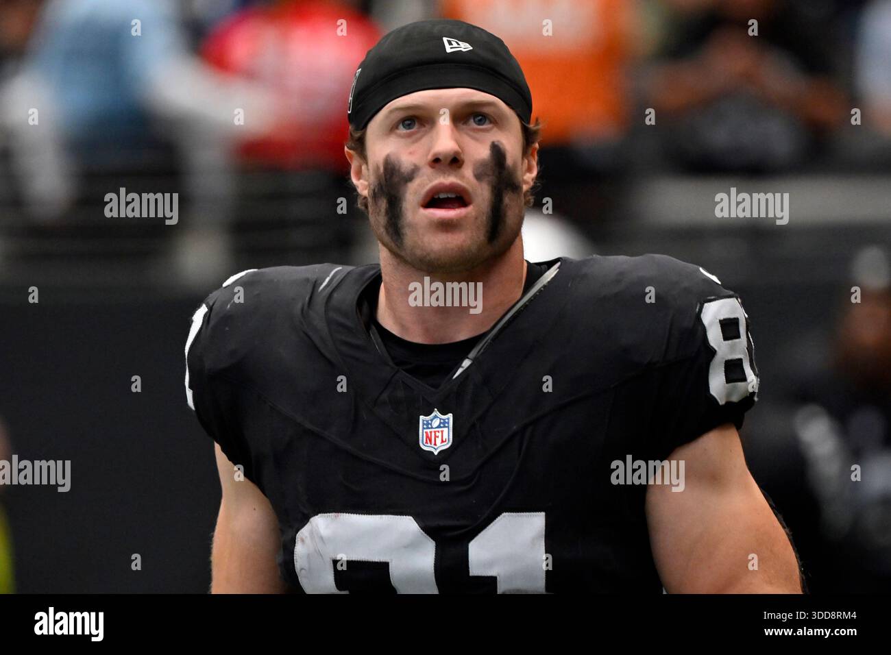 Raiders wide receiver Alex Bachman (81) takes the field after halftime ...