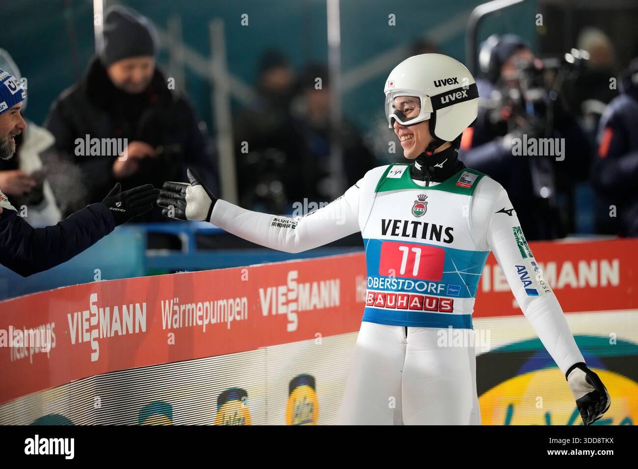 Naoki Nakamura, of Japan, reacts after his second round jump at the ...