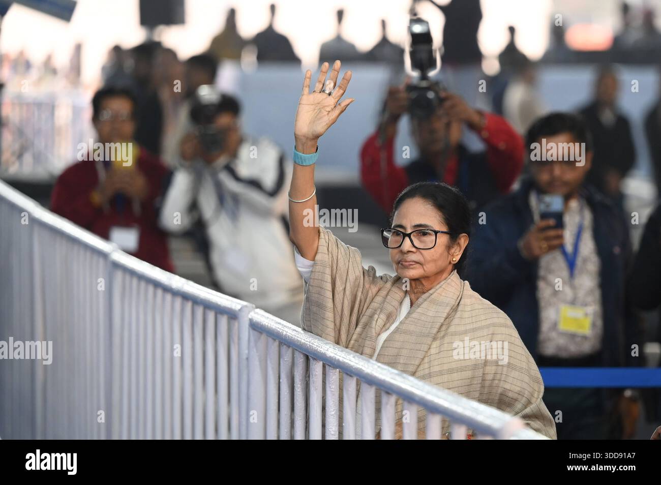 KOLKATA, INDIA - DECEMBER 29: Chief minister Mamata Banerjee waves hand ...