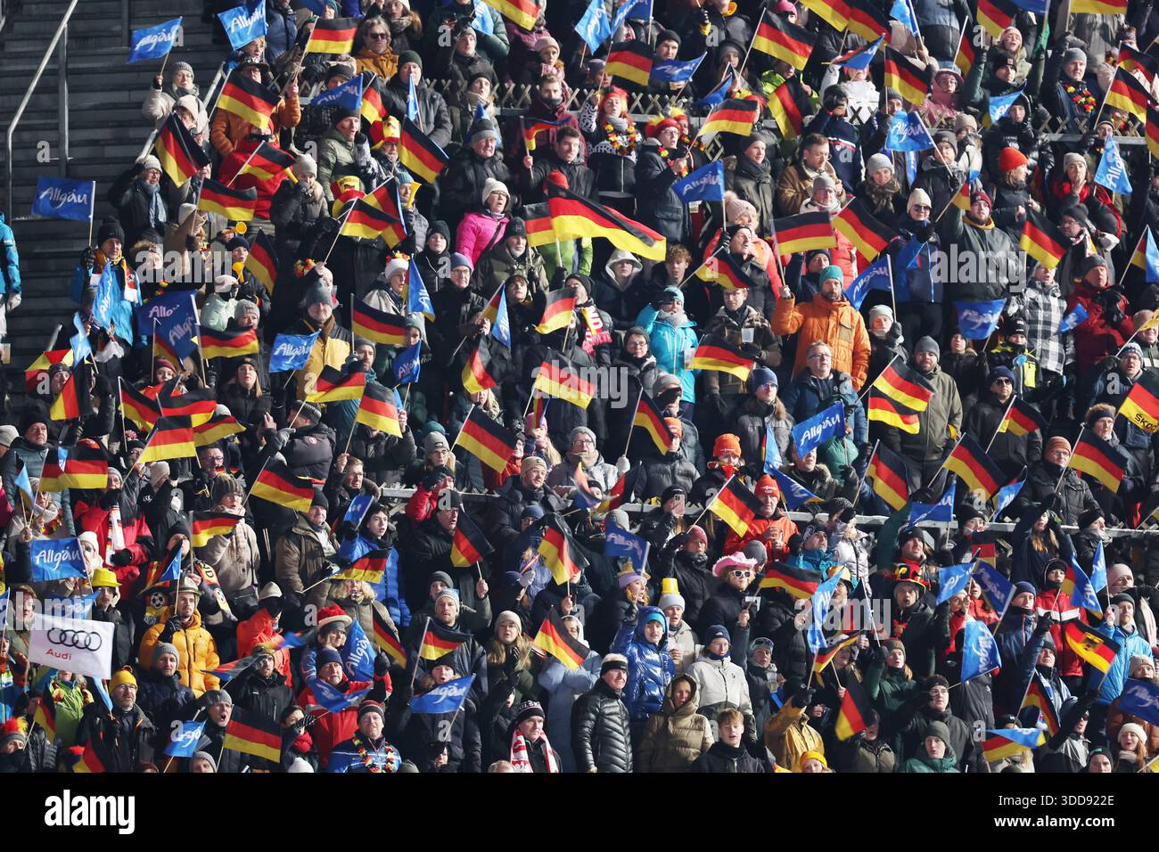 Spectators gather to watch men's individual KO HS137 of Ski Jumping ...