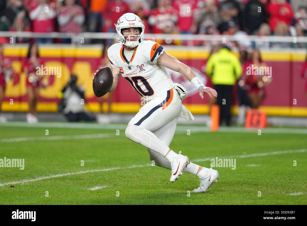 Denver Broncos quarterback Bo Nix runs during an NFL football game ...