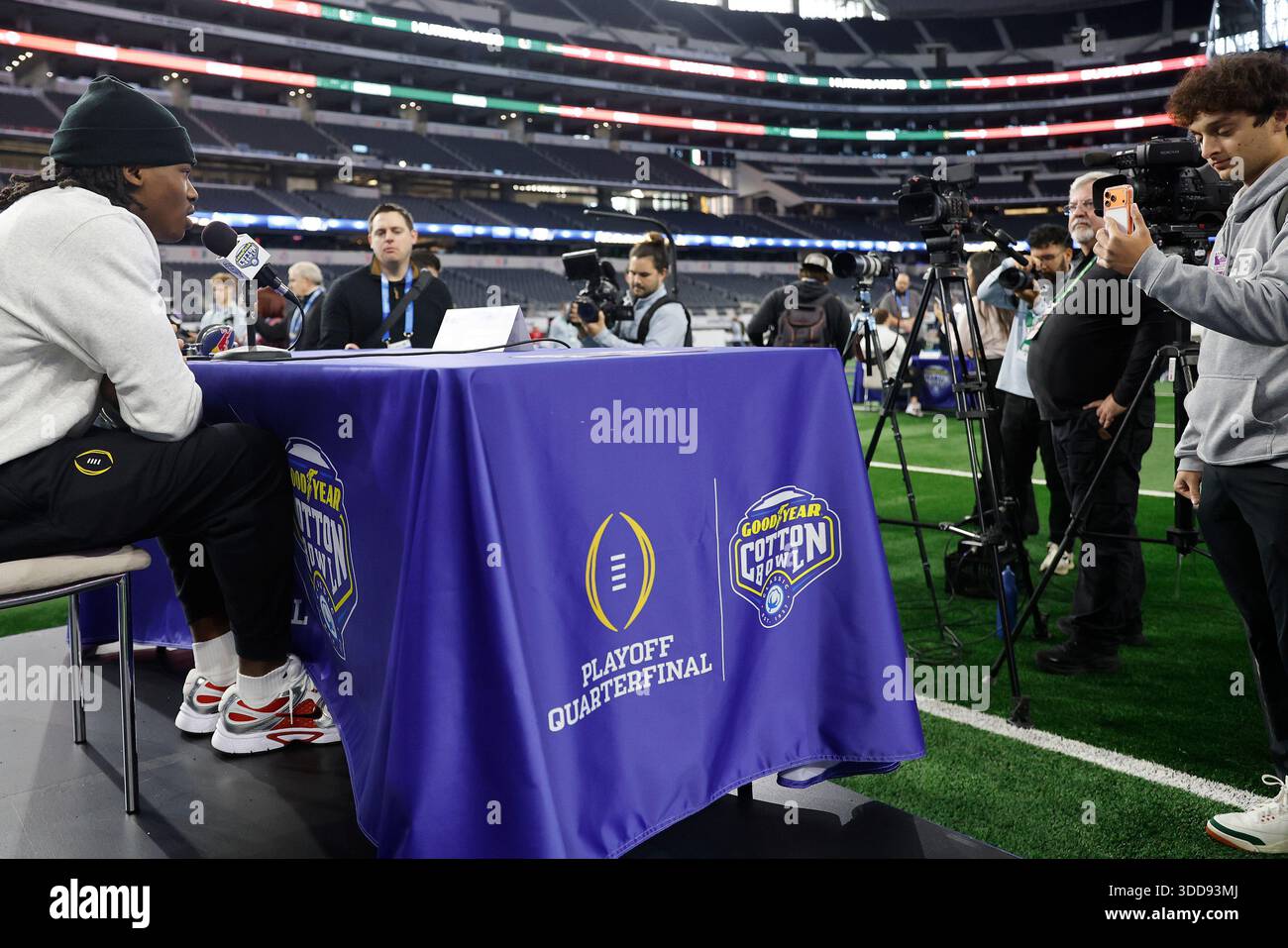 Ohio State receiver Jeremiah Smith talks to reporters during media day ...