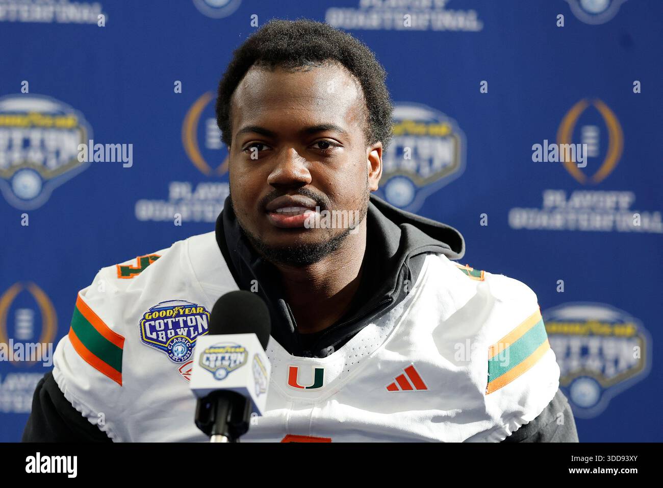 Miami defensive end Rueben Bain Jr. talks to reporters during media day ...