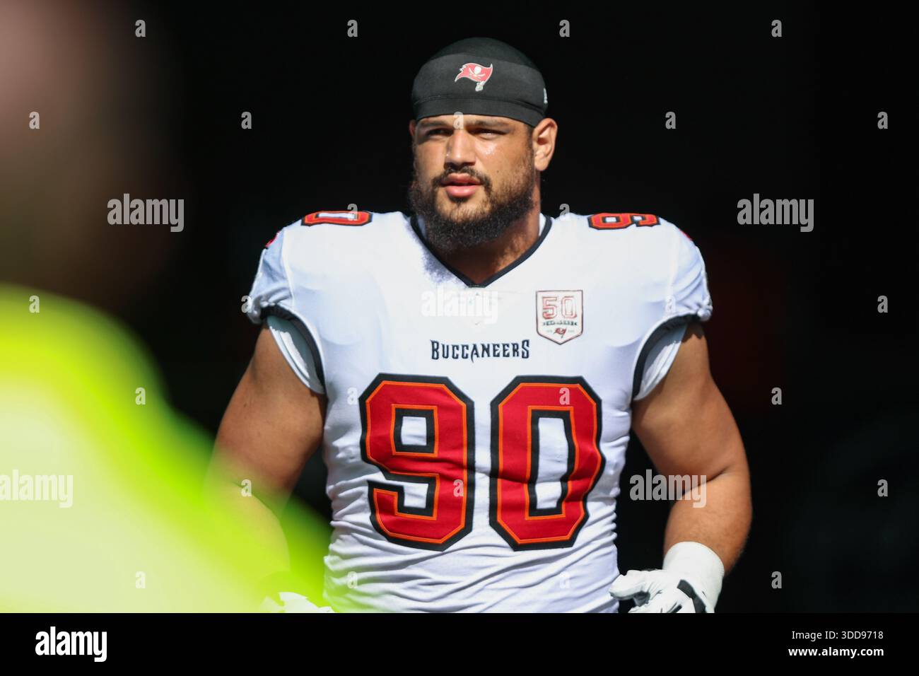 Tampa Bay Buccaneers defensive end Logan Hall (90) warms up before an ...