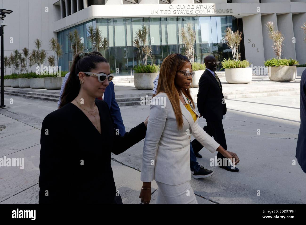 U.S. Rep. Sheila Cherfilus-McCormick, D-Fla., center, and attorney ...