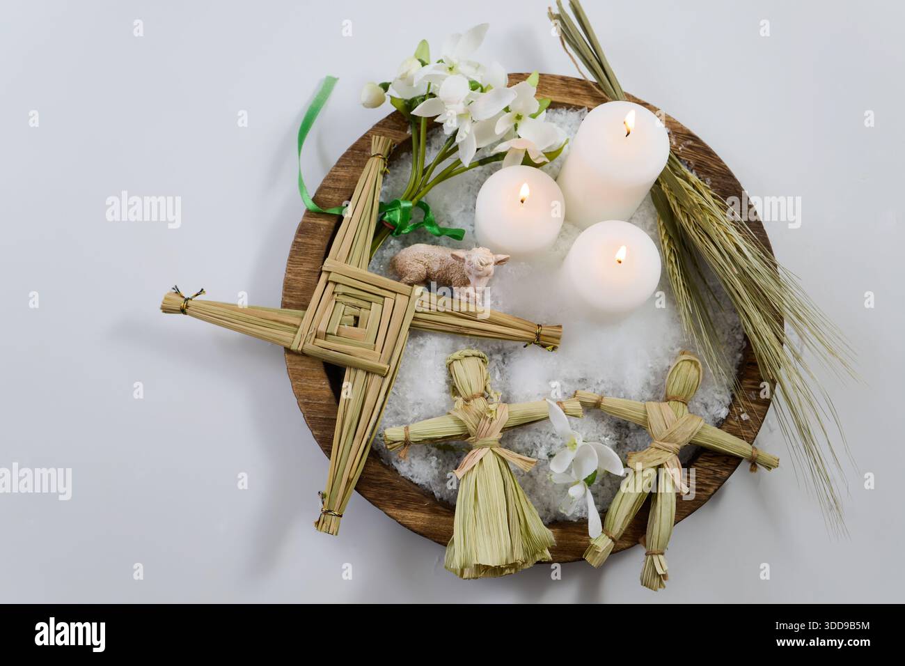 Imbolc altar with brigid's cross, candles, and corn dollies Stock Photo ...
