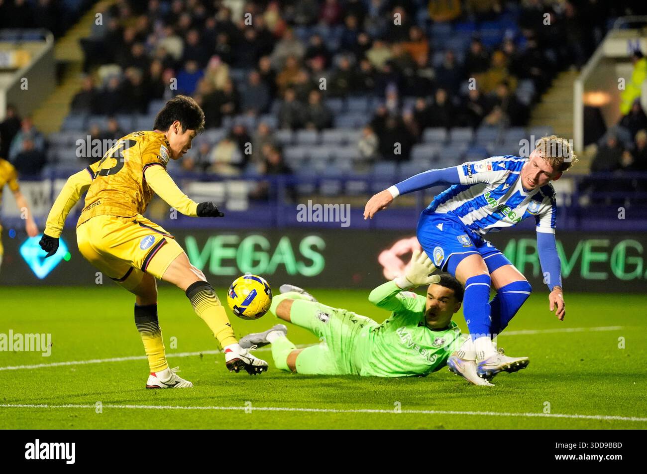 Blackburn Rovers' Yuki Ohashi (left) has a shot blocked by Sheffield ...
