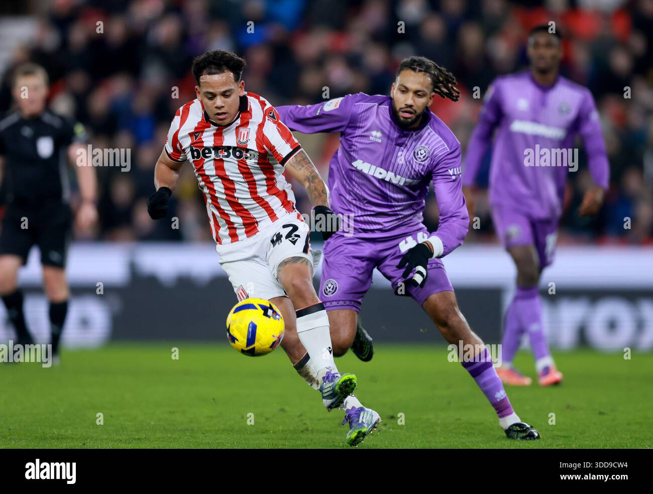 Stoke City's Million Manhoef (left) and Sheffield United's Jairo ...