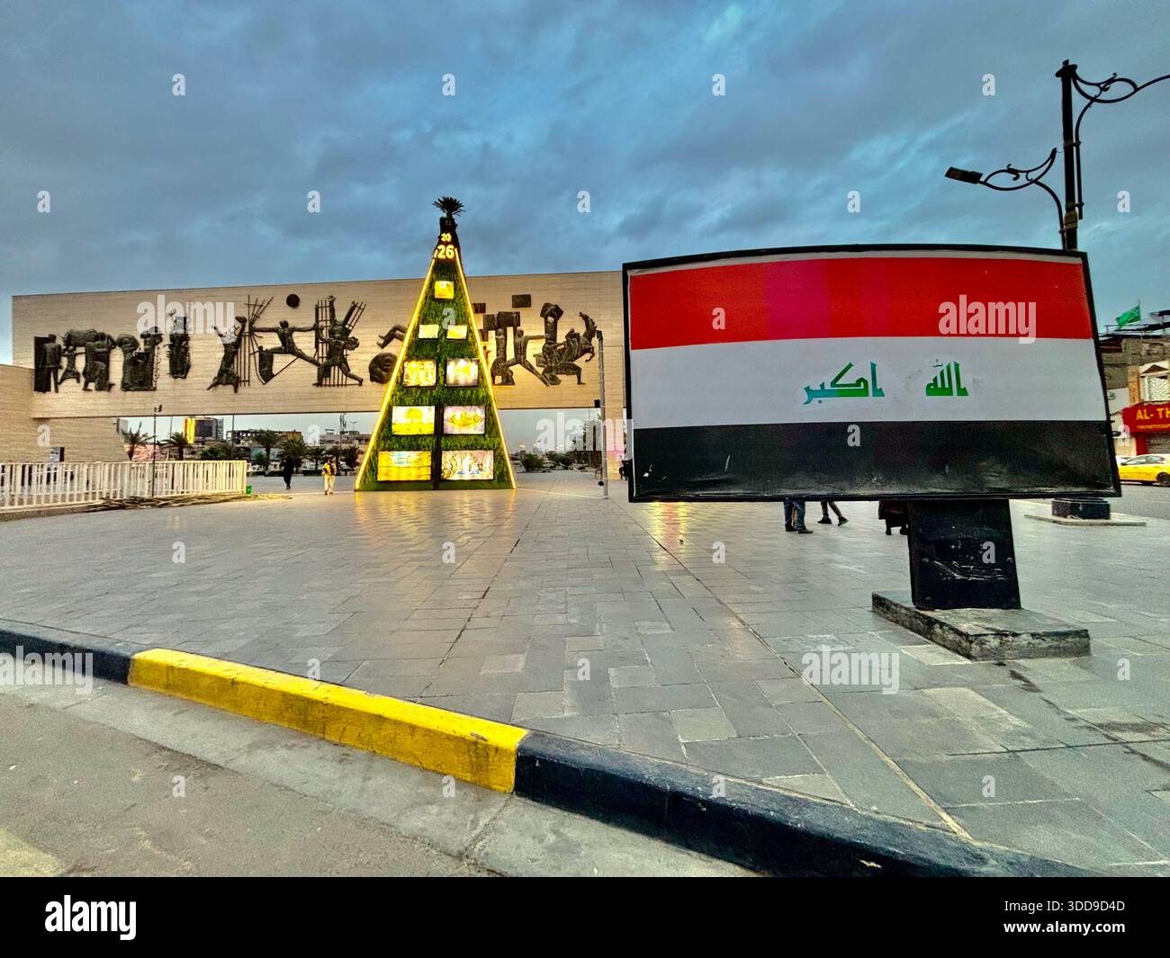 A Christmas tree stands in Tahrir Square in the heart of the Iraqi ...
