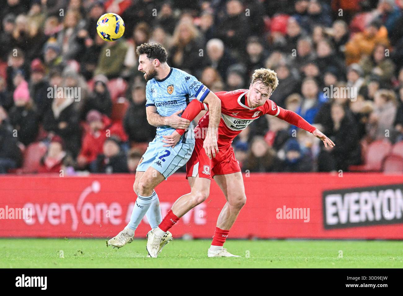 Lewis Coyle of Hull City and Tommy Conway of Middlesbrough FC during ...