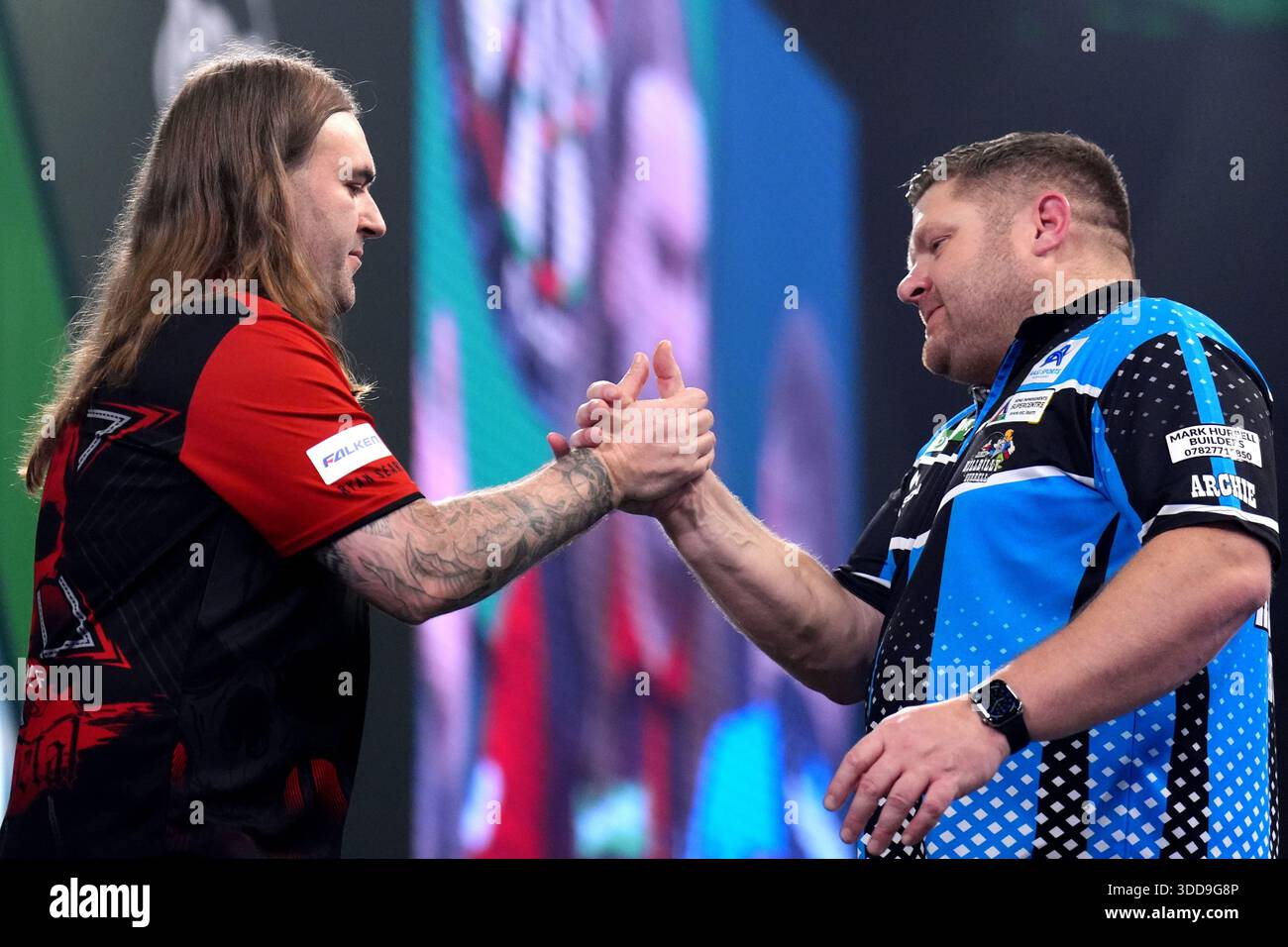 England's Ryan Searle (left) celebrates defeating England's James ...