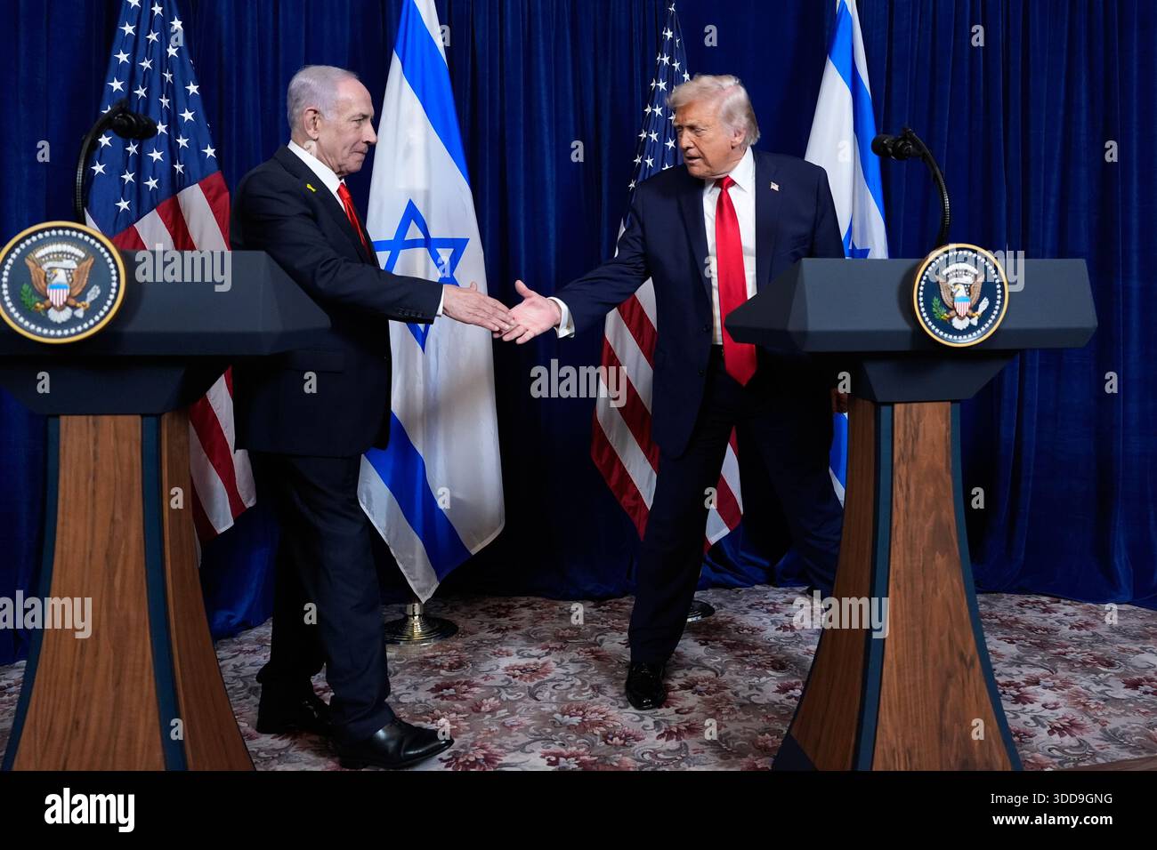 President Donald Trump shakes hands with Israel's Prime Minister ...
