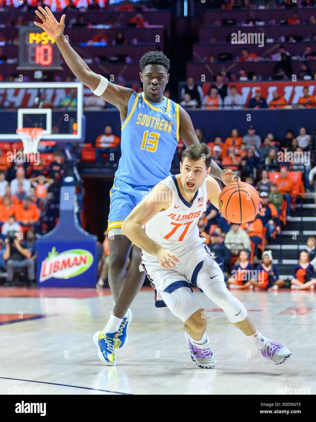 Illinois guard Mihailo Petrovic drives as Lionel Bell defends during ...