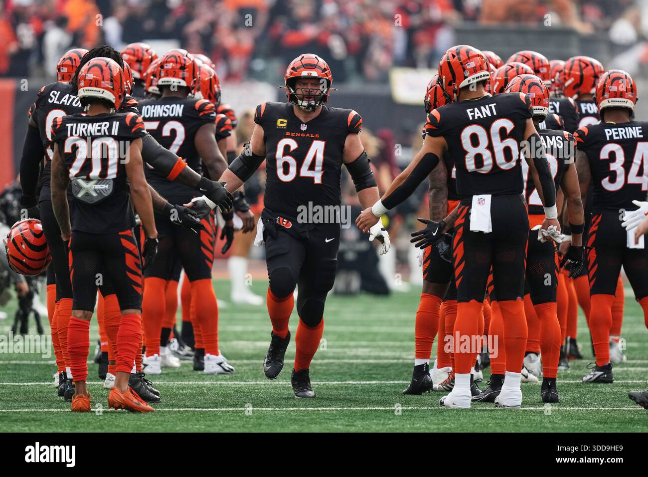 Cincinnati Bengals center Ted Karras (64) takes the field before an NFL ...