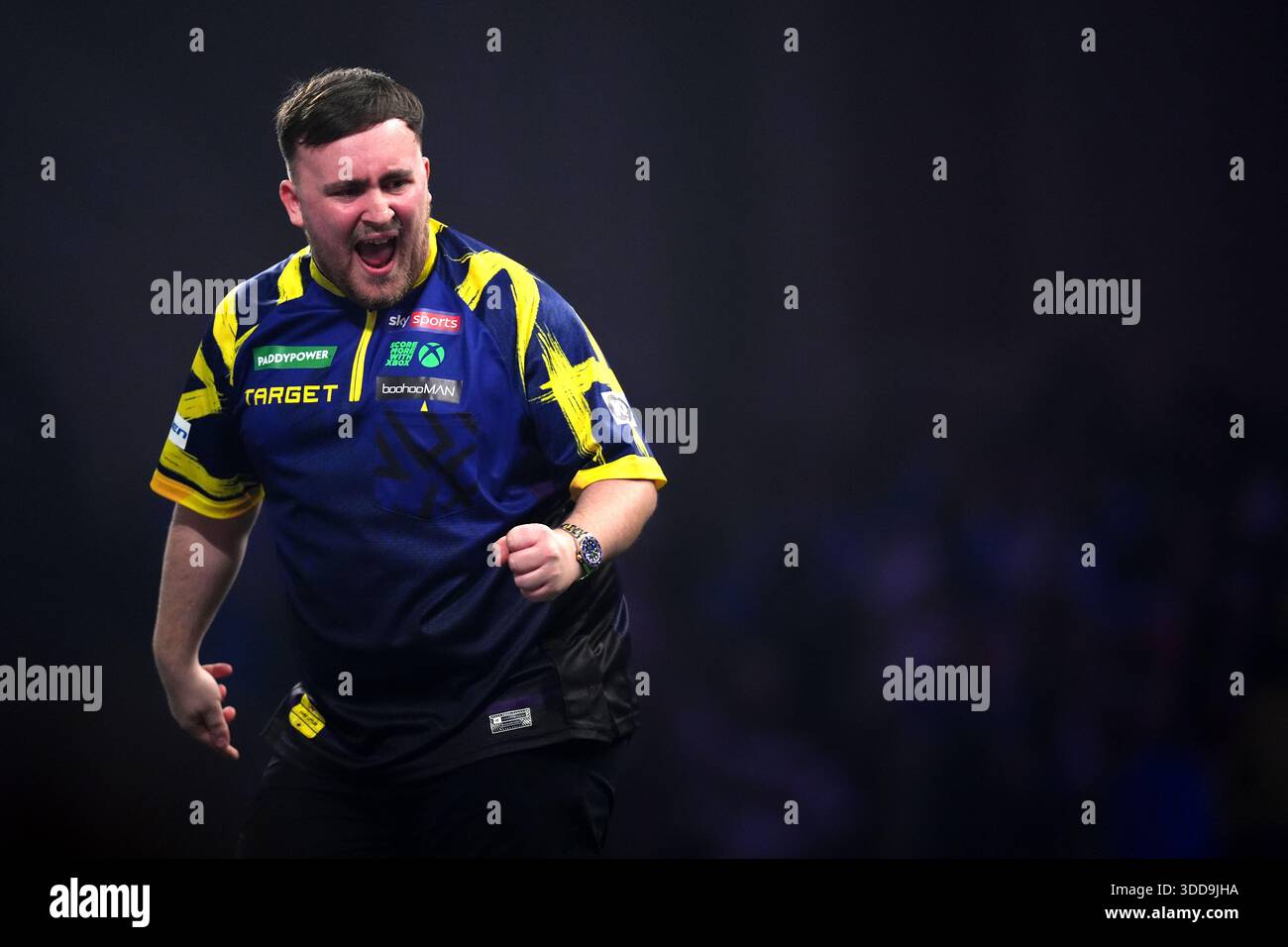 England's Luke Littler reacts during his match against England's Rob ...