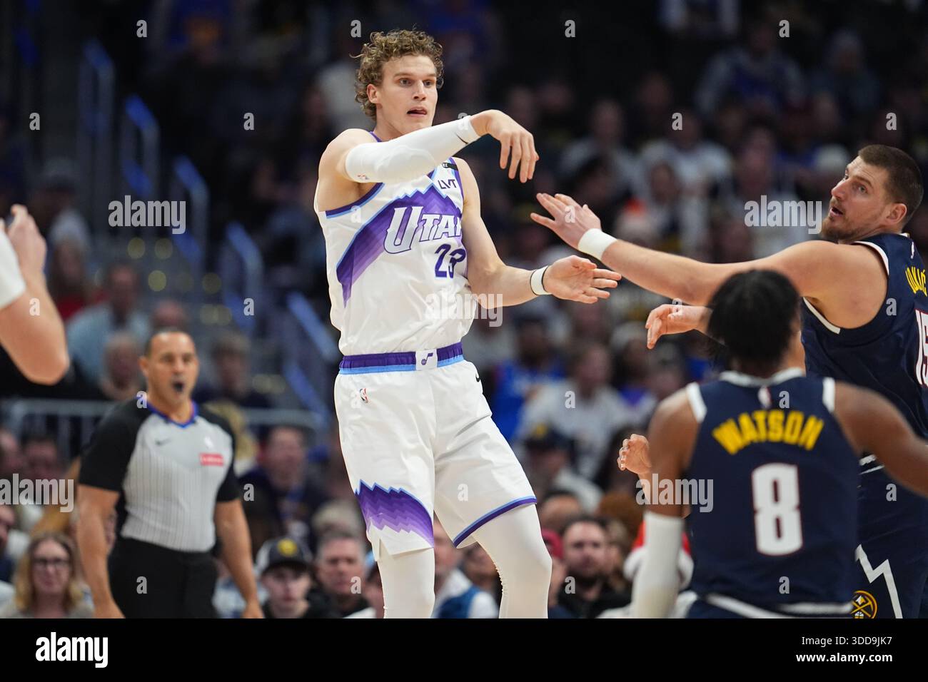 Utah Jazz forward Lauri Markkanen (23) completes pass as Denver Nuggets ...