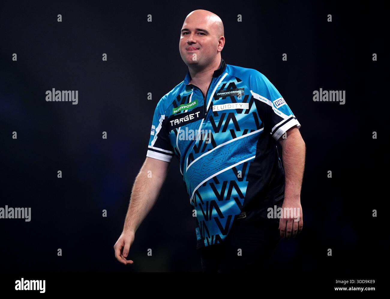 England's Rob Cross reacts during his match against England's Luke ...