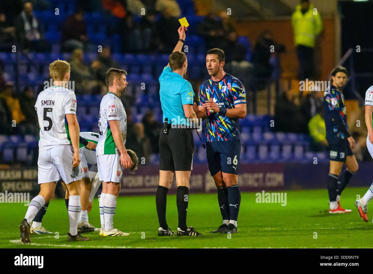 Niall Canavan of Barrow FC receives a 2nd yellow card from Referee ...