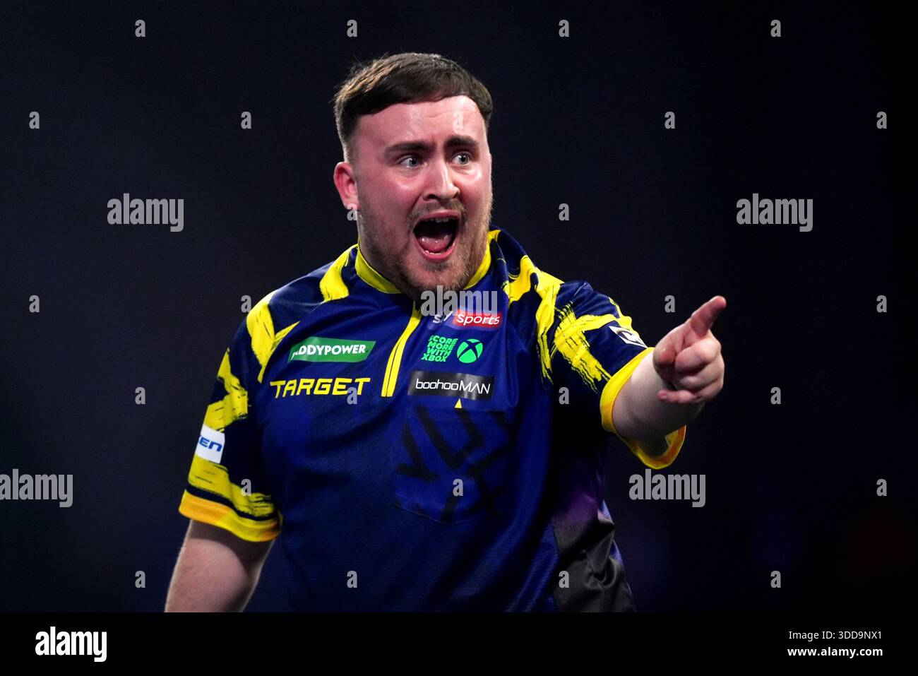 England's Luke Littler reacts during his match against England's Rob ...