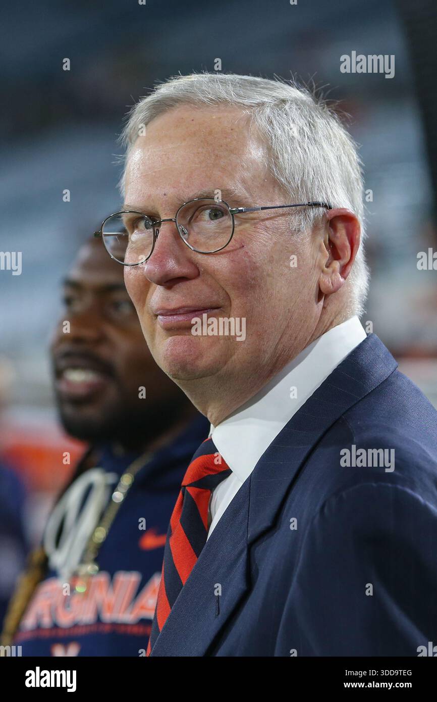 University of Virginia interim president Paul Mahoney walks the ...