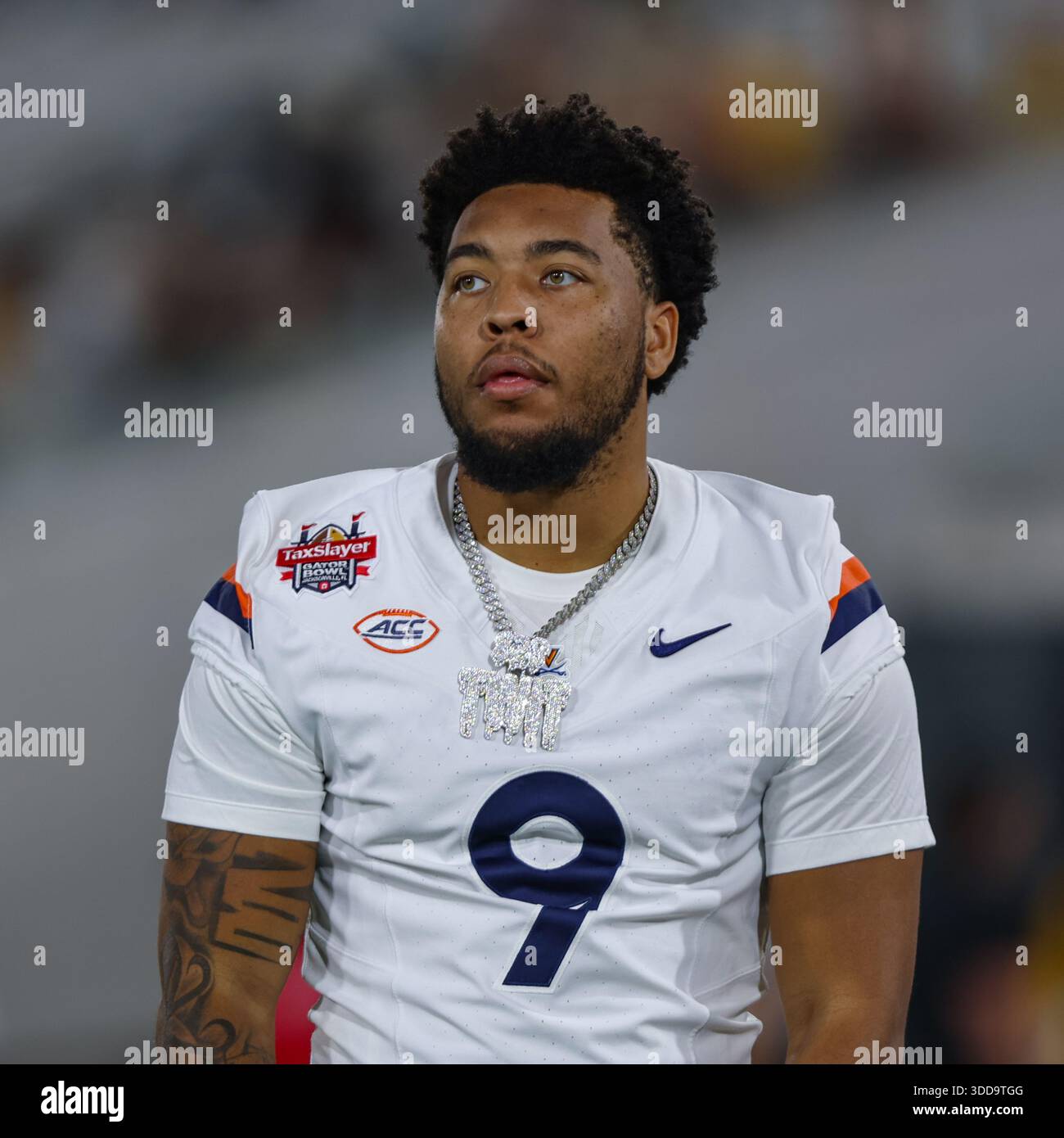 Virginia tight end Dakota Twitty (9) walks the field before the Gator ...
