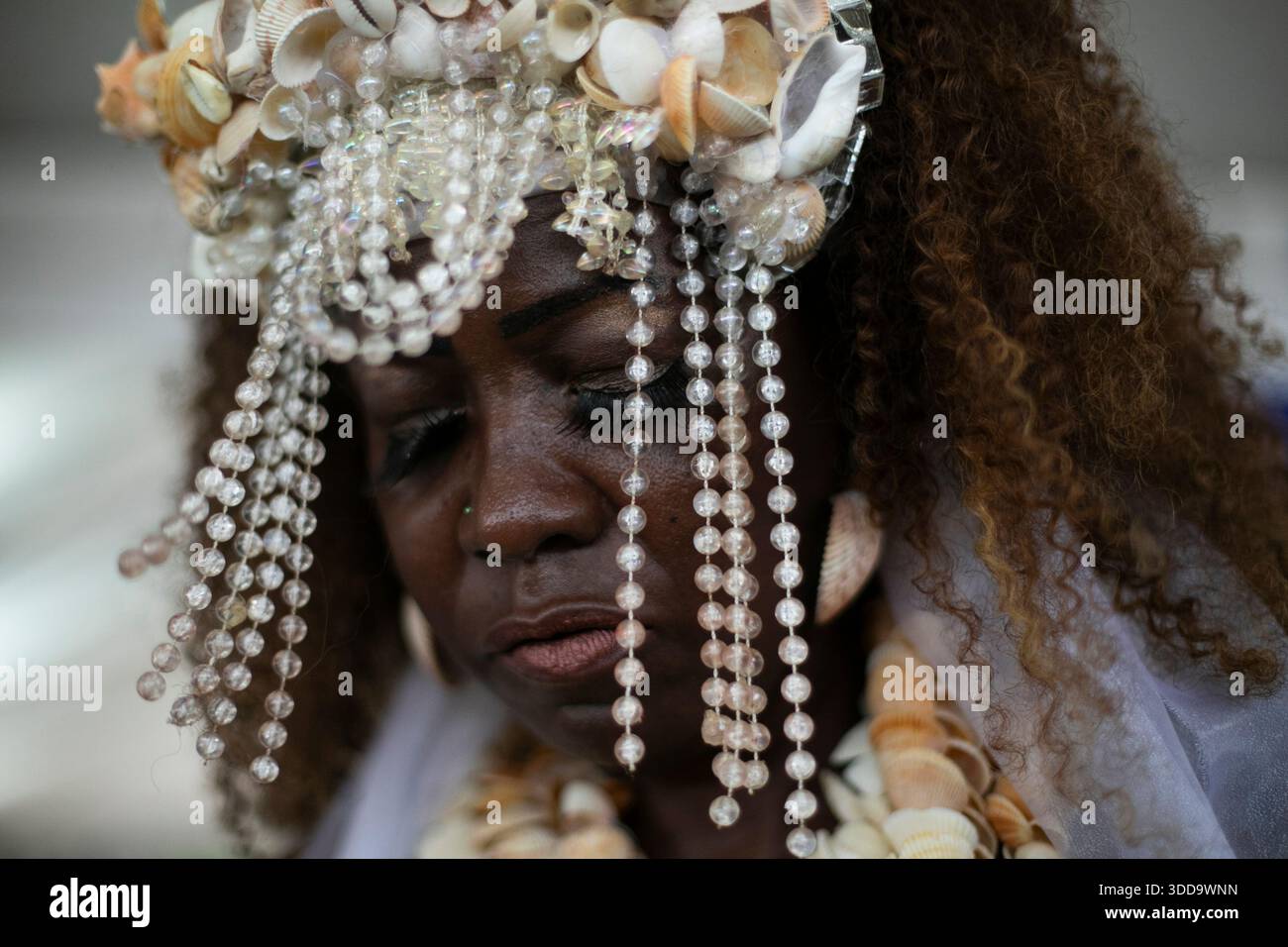 A devotee dances during a ceremony honoring Yemanja, the sea goddess of ...