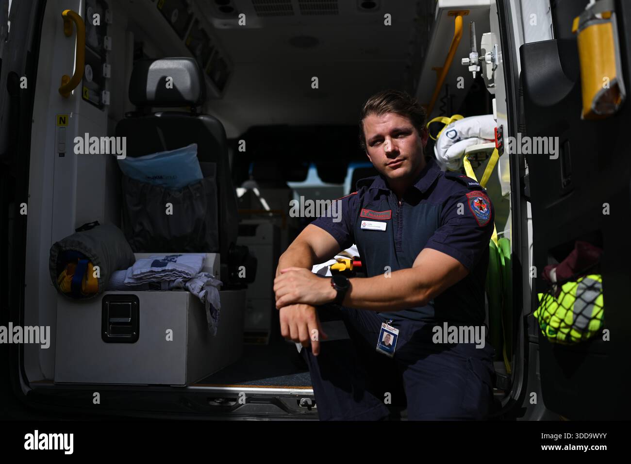 Ambulance Victoria paramedic Luke Harrington poses for a photograph in ...