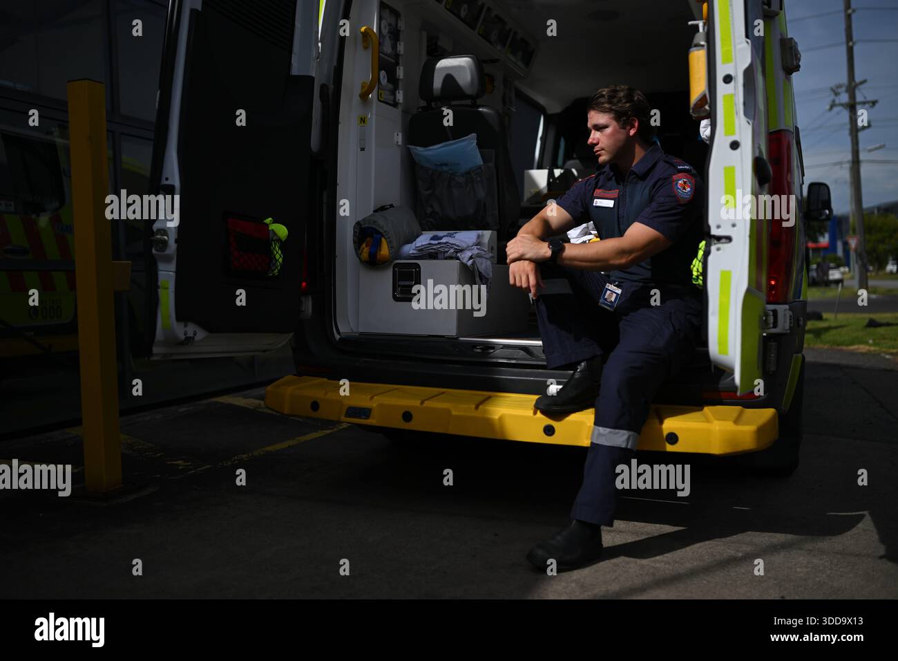 Ambulance Victoria paramedic Luke Harrington poses for a photograph in ...