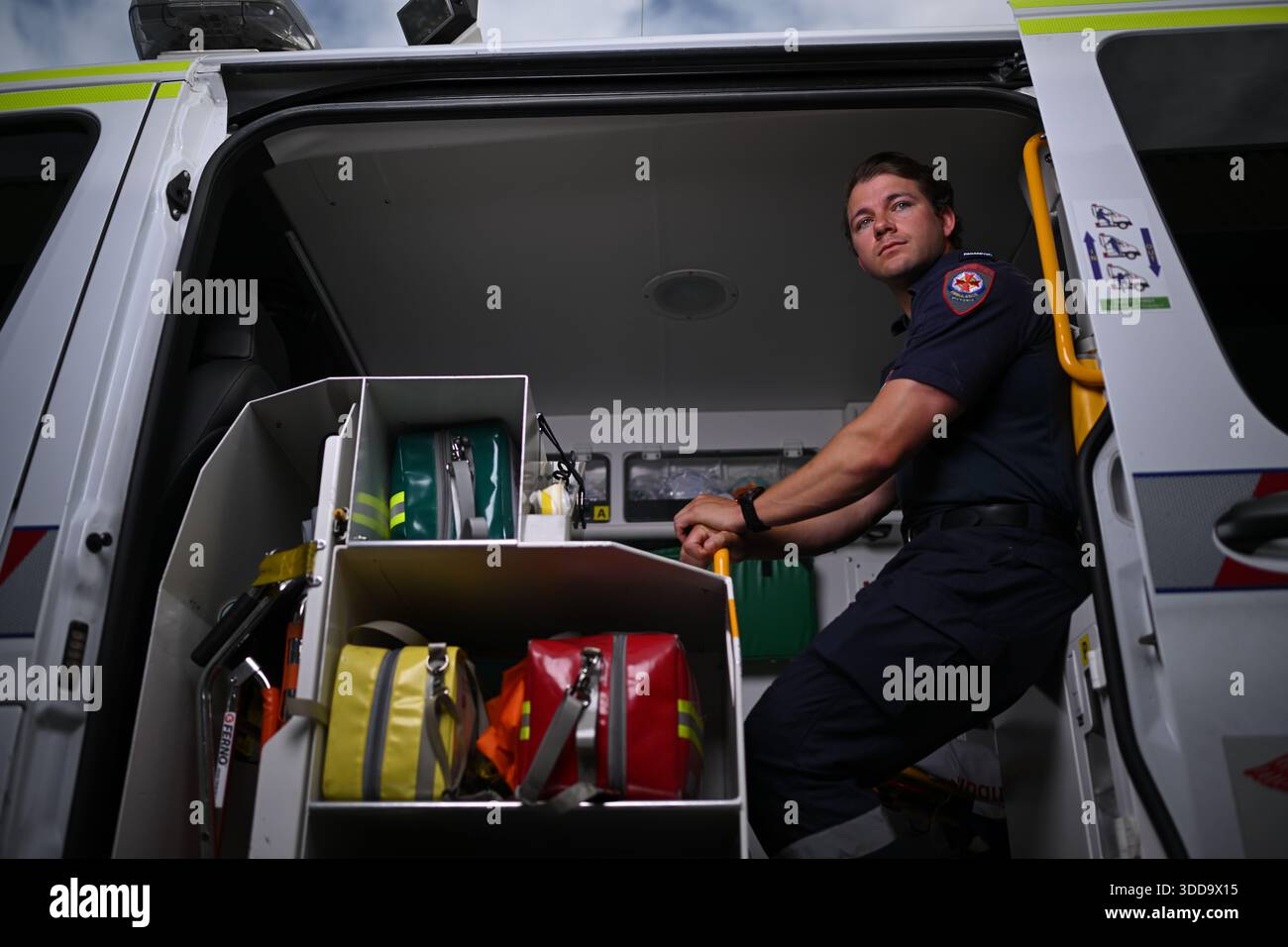Ambulance Victoria paramedic Luke Harrington poses for a photograph in ...