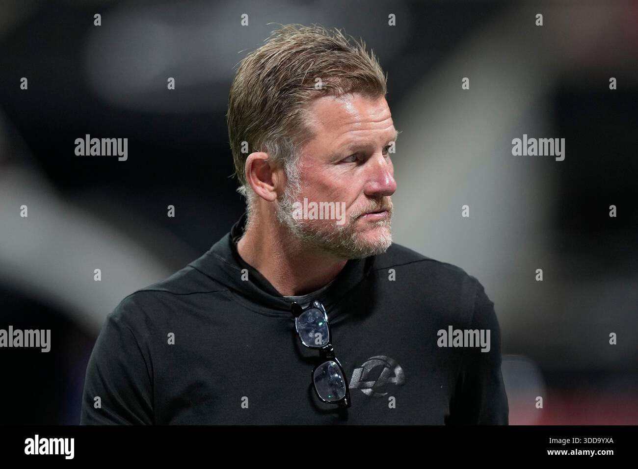 Los Angeles Rams general manager Les Snead walks on the field before an ...
