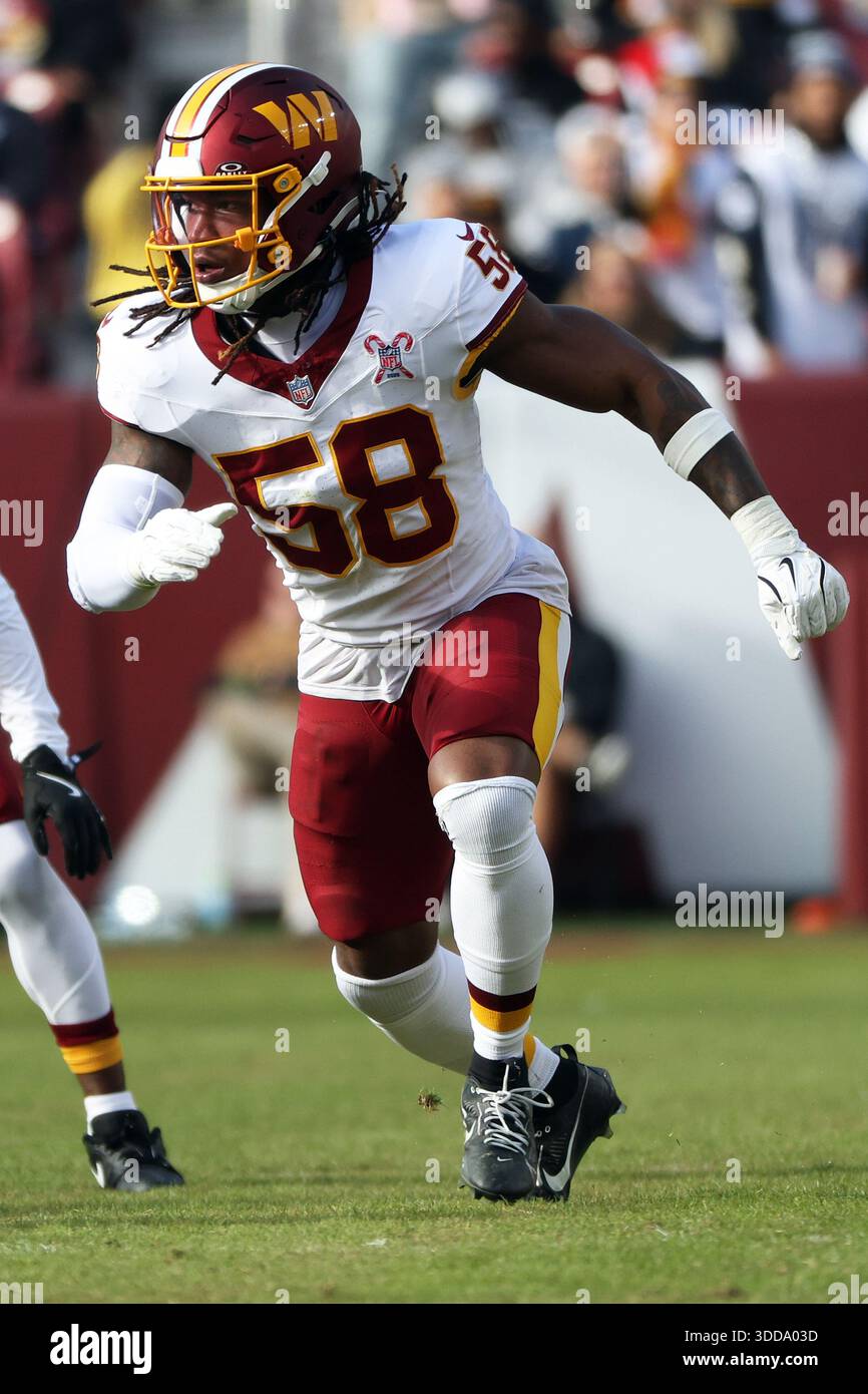 Washington Commanders linebacker Jordan Magee (58) rushes during an NFL ...