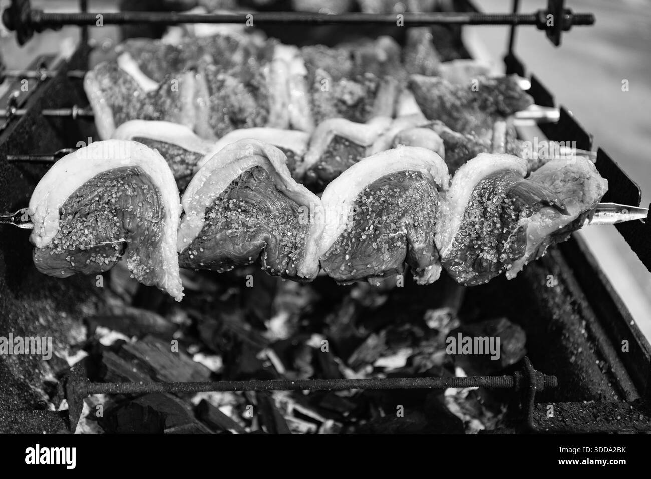 Beef meat BBQ grill. Steak rotisserie at steakhouse grill. Street food ...