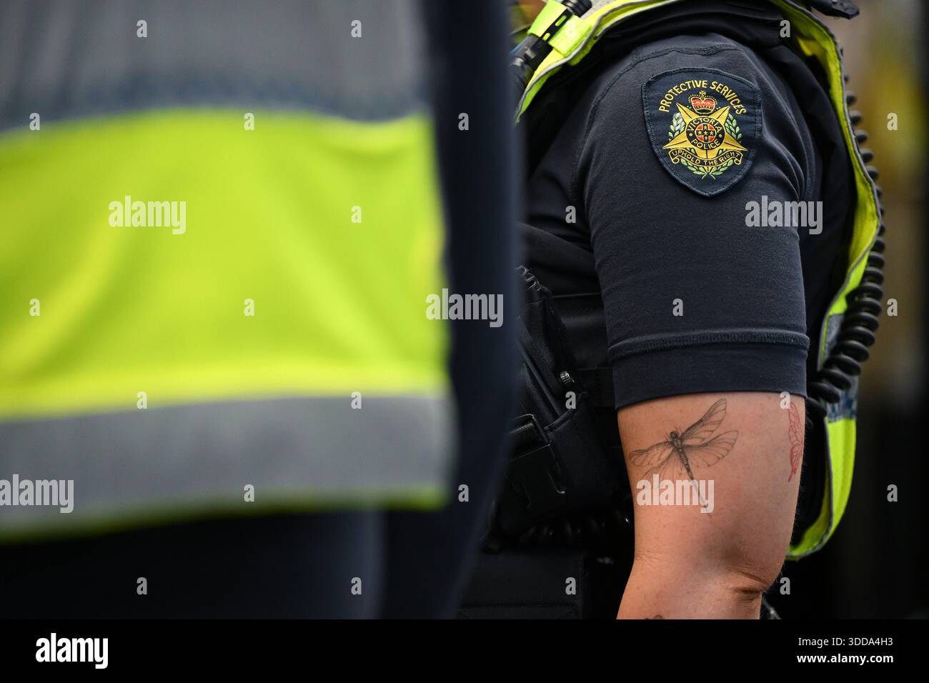 Detail image of a tattoo on the arm of a Victoria Police Protective ...